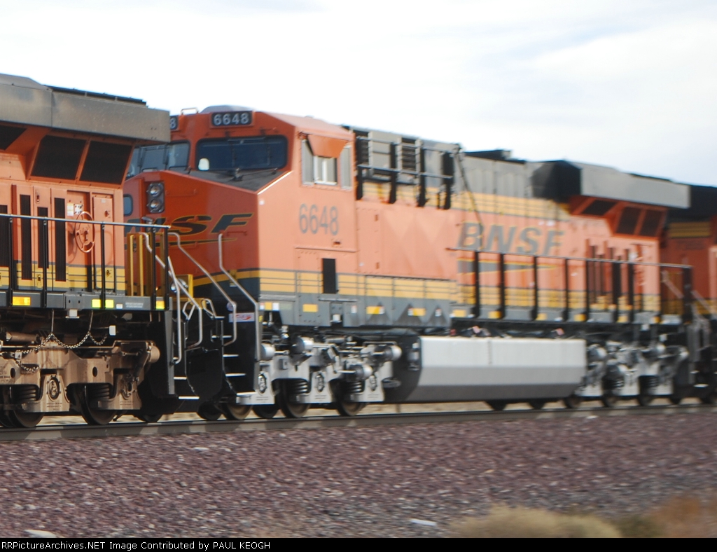 BNSF 6648 rolls westbound towards Mojave, Ca as a # 3 unit on a Z-Train.